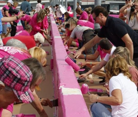 NASCAR drivers team with breast cancer survivors to paint pit wall pink ...